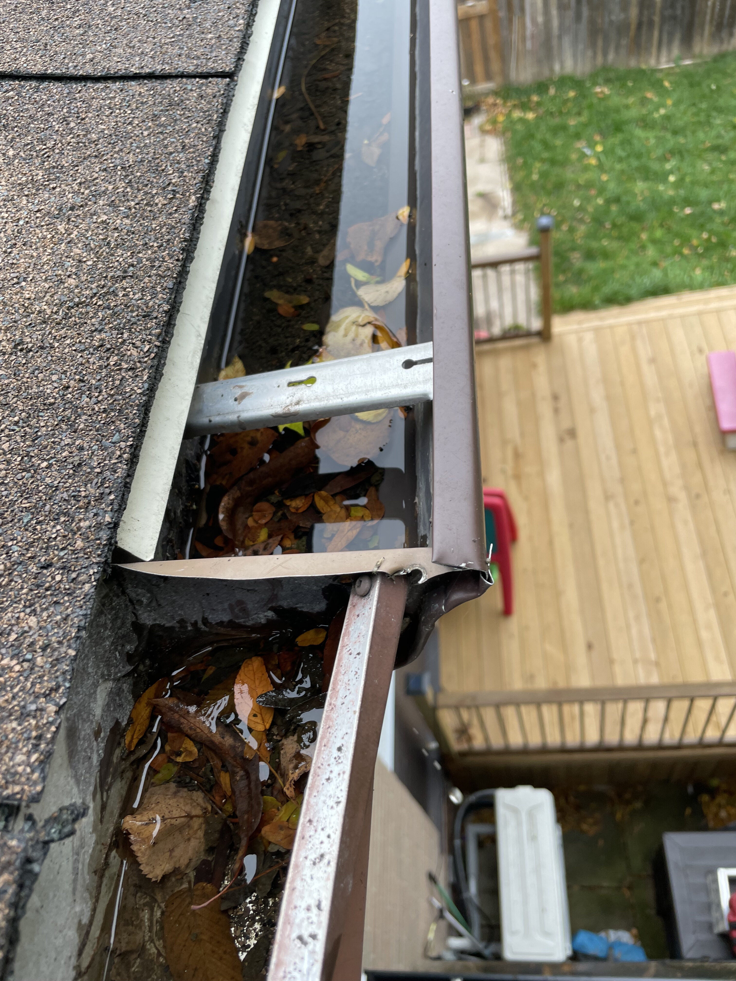 Had roofer re-secure section of gutter that separated, caused a new ...